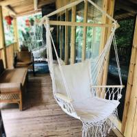 China Indoor and Outdoor Metal Frame Outdoor Swing Chair with Cotton Rope Hanging Hammock for sale