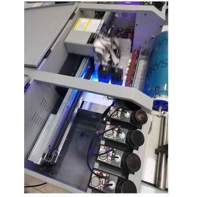 China ANDEMES 3060 3 in 1 Roll to Roll A3 UV Flatbed Printer for Food Shop UV Printing for sale