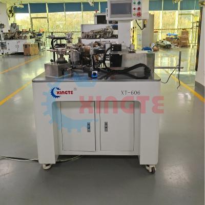 China Automatic Voice Coil Winding Machine XT-606 3000pcs/h 220V 50Hz Clockwise Counterclockwise for sale