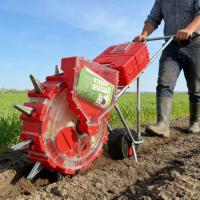 China Manual Seeder Hand-Push Planter with Adjustable Depth and Precision Sowing for Multi-Seed Compatibility for sale