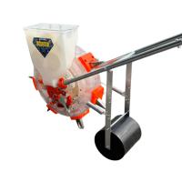 China ABS Steel Manual Seeder Machine Rust Resistant Hand Operated Seed Planter for sale