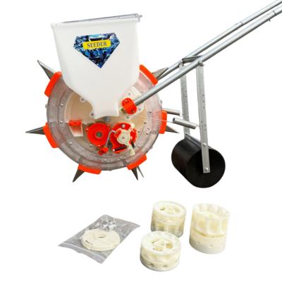 China Heavy Duty Manual Seeder Machine 7kg Seed Box Cast Iron Planter for Hard Soil for sale