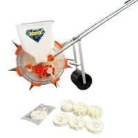 China Heavy Duty Manual Seeder Machine 7kg Seed Box Cast Iron Planter for Hard Soil for sale