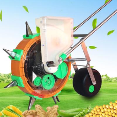 China Manual Seeder Machine Push Sower Efficient Heavy Duty Seeding Tool Farm Planting for sale