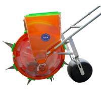 China Iron Manual Seeder Machine Hand Push Planter Tough Ground Sower Versatile for sale