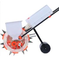 China Robust Handheld Manual Seeder Machine With Fertilizing Crop Sowing Machine for sale