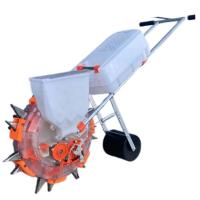 China Manual Seeder Machine With Fertilizing Dual Purpose Hand Push Sower For Optimized Crop for sale
