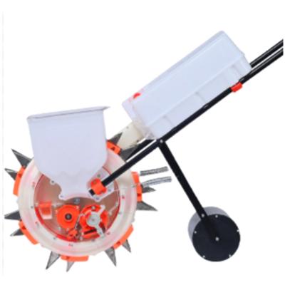 China Manual Seeder Machine With Fertilizing Hand Push Sower Tool for sale