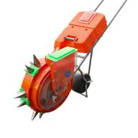 China Manual Fertilizer and Seeding Machine for Corn Farm 2-in-1 Hand Push Tool for sale