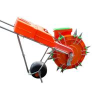 China Manual Fertilizer and Seeding Machine for Corn Farm 2-in-1 Hand Push Tool for sale