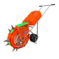 China Manual Fertilizer and Seeding Machine for Corn Farm 2-in-1 Hand Push Tool for sale