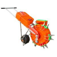China Manual Planter and Fertilizer for Peanut Farm Dual-Chamber Hand Push 14-56cm Plant Spacing for sale