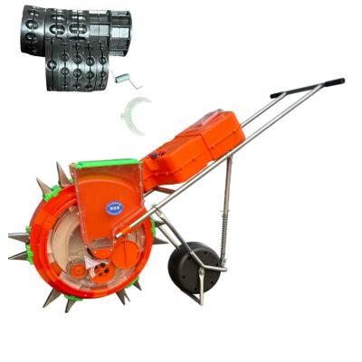 China Manual Planter and Fertilizer for Peanut Farm Dual-Chamber Hand Push 14-56cm Plant Spacing for sale