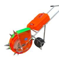 China Vegetables Hand Push Seeder With Fertilizer Applicator 12 Nozzle Adjustable for sale