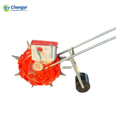 China Portable Steel Manual Seeder Planter 7kg Seed Box Adjustable Spacing Multi Crop for sale