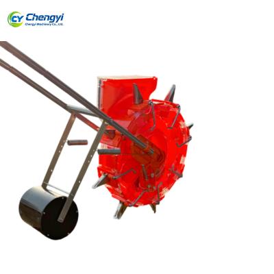 China Portable Steel Manual Seeder Planter 7kg Seed Box Adjustable Spacing Multi Crop for sale