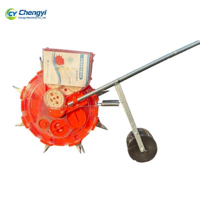 China Stainless Steel Manual Seeder Machine 7kg Seed Box Multi Crop Seed Sowing Planter for sale