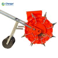 China Steel Manual Seeder Machine Seed Drill 7kg Capacity Adjustable Planting Equipment for sale