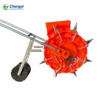 China Steel Manual Seeder Machine Seed Drill 7kg Capacity Adjustable Planting Equipment for sale
