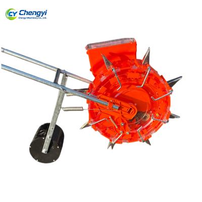 China Steel Manual Seeder Machine Seed Drill 7kg Capacity Adjustable Planting Equipment for sale