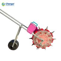 China Farmland Heavy Duty Hand Push Seeder 7kg Seed Capacity Rust Resistant Coating for sale