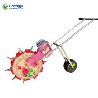 China Heavy Duty Iron Hand Push Seeder Rust Resistant Coating For 4Kg Seed Capacity for sale