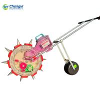 China Farmland Cultivation Hand Push Seeder With Large Diameter Push Wheels for sale