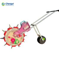 China Farmland Cultivation Hand Push Seeder With Large Diameter Push Wheels for sale