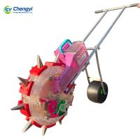 China Rust Resistant Steel Hand Push Seeder With Adjustable 15-30cm Row Spacing for sale