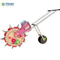 China Rust Resistant Steel Hand Push Seeder With Adjustable 15-30cm Row Spacing for sale