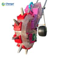 China Farmland Heavy Duty Hand Push Seeder 7kg Seed Capacity Rust Resistant Coating for sale