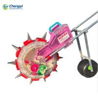 China Heavy Duty Iron Hand Push Seeder Rust Resistant Coating For 4Kg Seed Capacity for sale