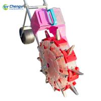 China Rust Resistant Steel Hand Push Seeder With Adjustable 15-30cm Row Spacing for sale