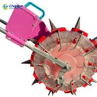 China Heavy Duty Iron Hand Push Seeder Rust Resistant Coating For 4Kg Seed Capacity for sale