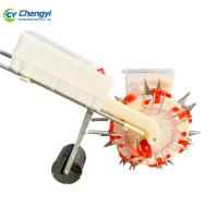 China ABS Steel Manual Seeder Machine 14.5kg Simultaneous Sowing Fertilization Adjustable Depth for Wheat Corn Soybean for sale