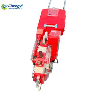 China Manual Seeder Machine with Fertilization Versatile Hand Planter for sale