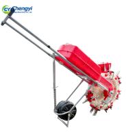 China Manual Seeder Machine with Fertilization Efficient Hand Planter for Crops for sale