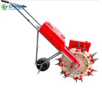 China Manual Seeder Machine with Fertilization Efficient Hand Planter for Crops for sale