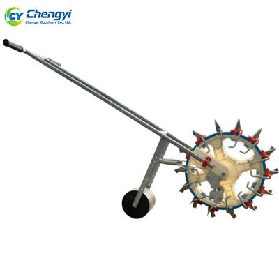 China Plastic Manual Seeder Machine 7kg Capacity Lightweight Hand Push Planter for Farms for sale