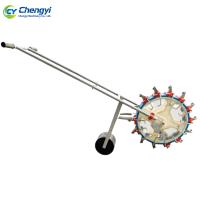 China Plastic Manual Seeder Machine 7kg Capacity Lightweight Hand Push Planter for Farms for sale