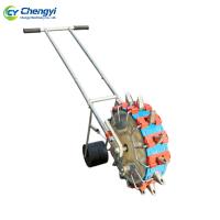 China Plastic Manual Seeder Machine 7kg Capacity Lightweight Hand Push Planter for Farms for sale