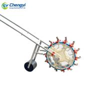 China Iron Manual Seeder Machine 7kg Capacity Hand Push Planter for Precise Sowing for sale