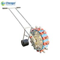 China Plastic Manual Seeder Machine Adjustable Depth 7kg Seed Box Ergonomic Vegetable Seed Planter for sale