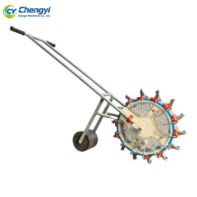 China Plastic Manual Seeder Machine Adjustable Depth 7kg Seed Box Ergonomic Vegetable Seed Planter for sale