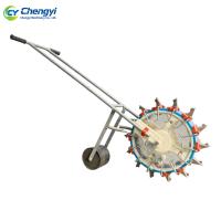 China Iron Manual Seeder Machine 7kg Capacity Hand Push Planter for Precise Sowing for sale