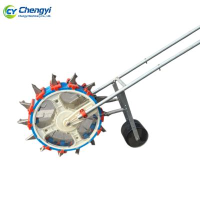 China Hand Push Seeder for Small Grain Vegetables with Precise Spacing and Portable Design for sale