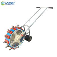 China Hand Push Seeder for Precise Sowing with Lightweight Design and Uniform Seed Spacing for sale