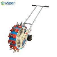 China Hand Push Seeder for Precise Sowing with Lightweight Design and Uniform Seed Spacing for sale