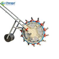 China Polycarbonate Hand Push Seeder 7kg Seed Box Precision Manual Garden Sower Planter Tool for sale