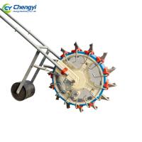 China Polycarbonate Hand Push Seeder 7kg Seed Box Precision Manual Garden Sower Planter Tool for sale